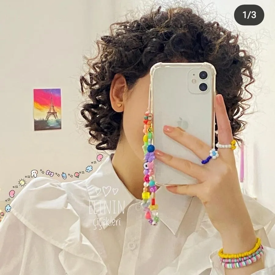 کمدا | قیمت و خرید آویز گوشی رنگ موجود در عکس